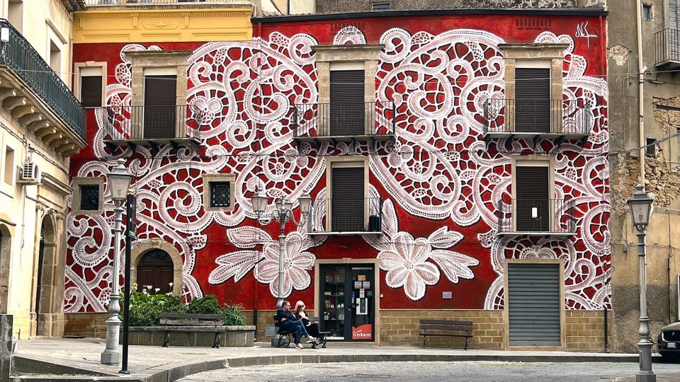Who is the Polish street artist behind the giant lace murals found in ...